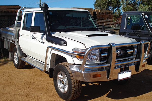 Landcruiser Toyota 70 Series with a bullbar and sidestep - Irvin Bullbars